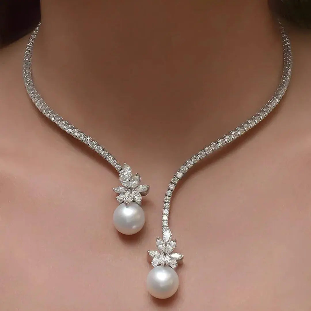Elegant shiny necklace with pearls made of sterling silver ...